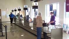 A woman checking out in a Goodwill store - Goodwill Industries ...