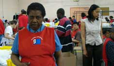 Woman working with assembly group - Goodwill Industries International